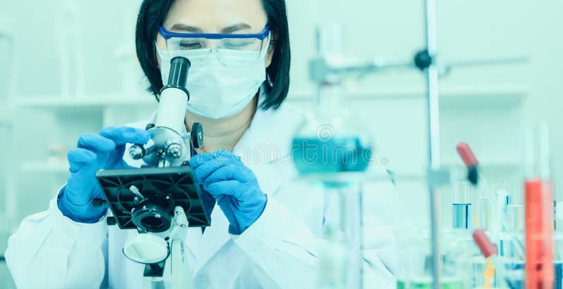 Scientis Using Microscope To Work in Lab Stock Image - Image of ...