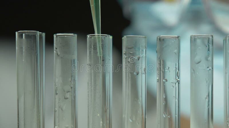 Scientist Adding Sample, Liquid Evaporating from Test Tube, Nuclear ...