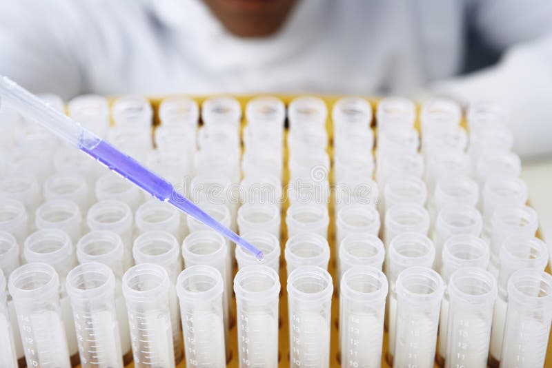 Adding Solution To a Test Tube Stock Photo - Image of tubes, health ...