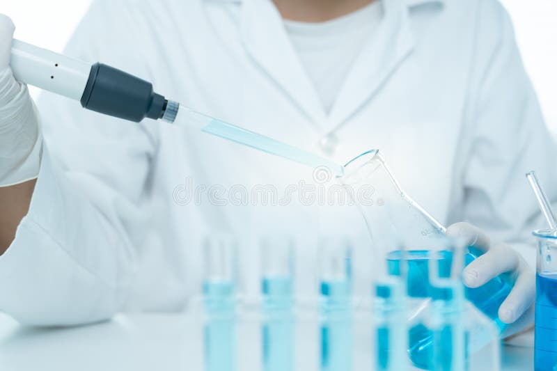 Scientist Analyze Biochemical Samples in Advanced Scientific Laboratory ...