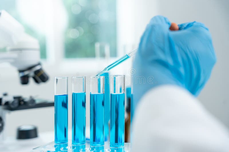 Scientist Analyze Biochemical Samples in Advanced Scientific Laboratory ...