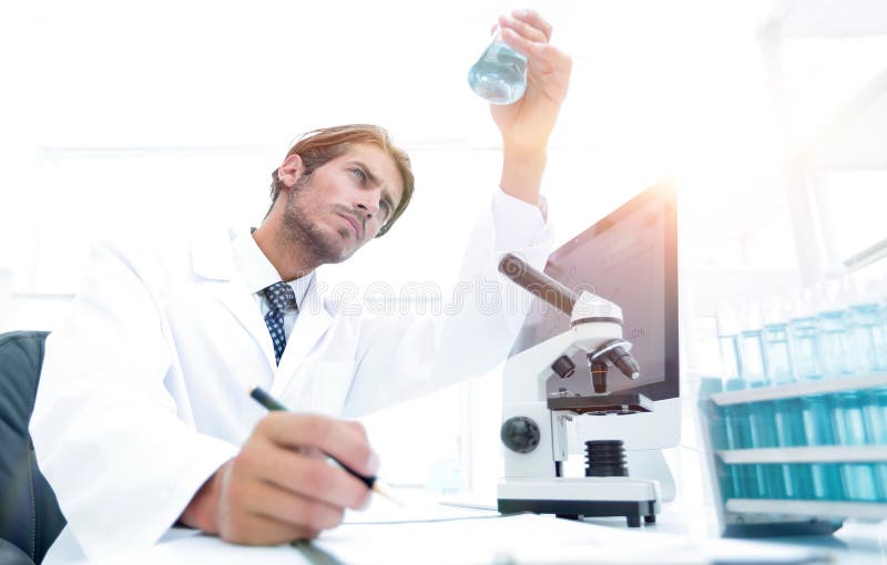 Scientist Analyzing an Experiment in a Laboratory Stock Photo - Image ...