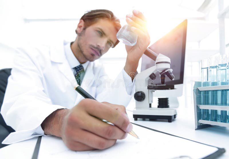 Scientist Analyzing an Experiment in a Laboratory Stock Image - Image ...