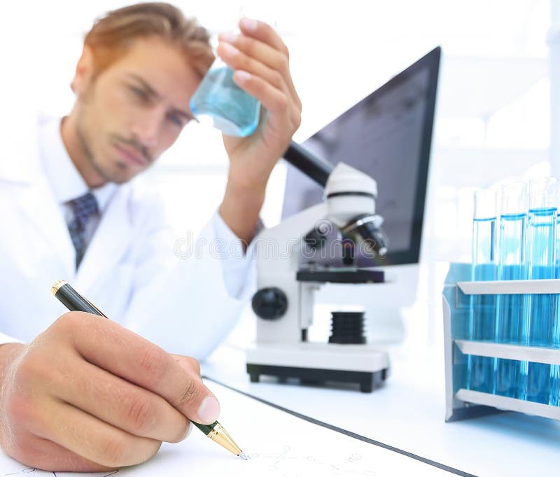 Scientist Analyzing an Experiment in a Laboratory Stock Image - Image ...