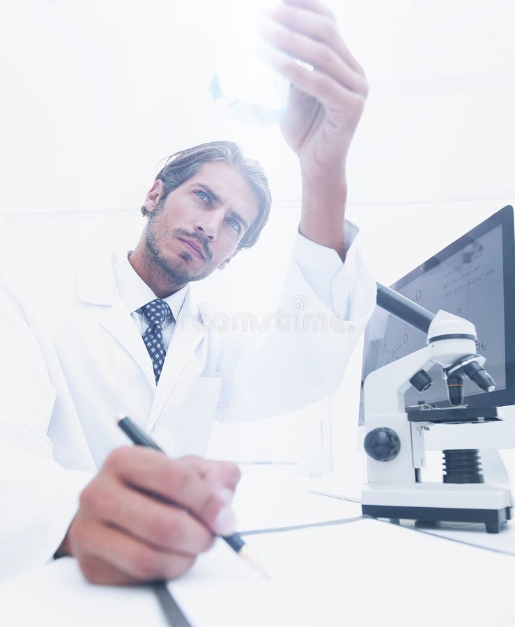 Scientist Analyzing an Experiment in a Laboratory Stock Image - Image ...
