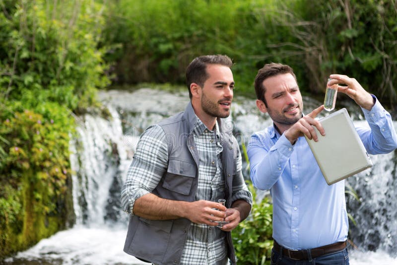 Scientist and Biologist Working Together on Water Analysis Stock Photo ...