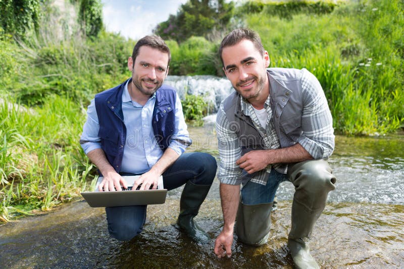 Scientist and Biologist Working Together on Water Analysis Stock Photo ...