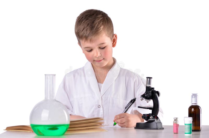 Scientist Boy in the Chemistry Lab Write with a Pen Stock Photo - Image ...
