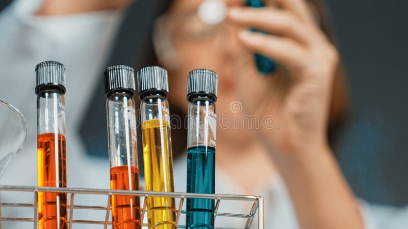 Scientist Bring Colored Solution or Chemical Liquid Doing Experiment ...