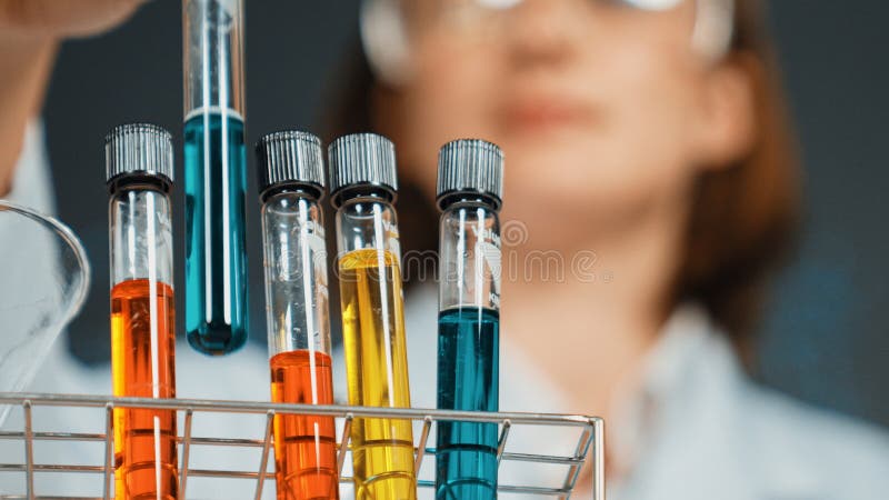 Scientist Bring Colored Solution or Chemical Liquid Doing Experiment ...