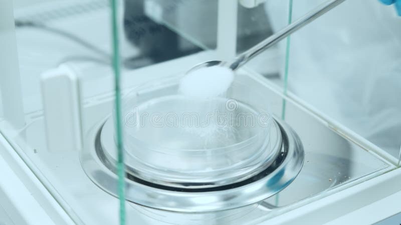 Measurement of PH of the Solution Using Indicator Paper. Scientist in ...