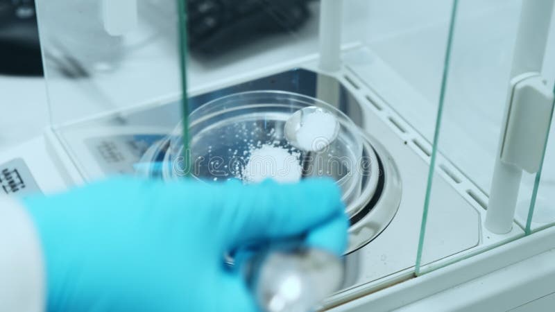 Measurement of PH of the Solution Using Indicator Paper. Scientist in ...