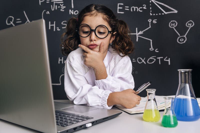 Scientist Child Looking Pensive To the Computer Stock Photo - Image of ...