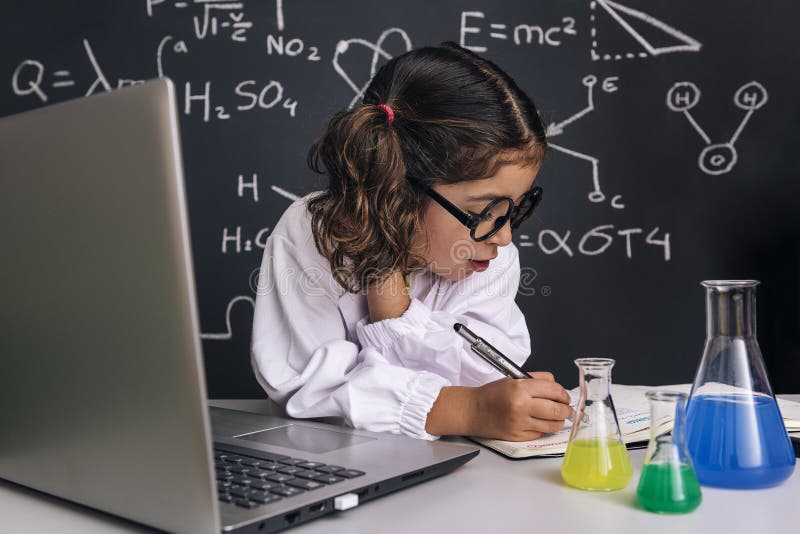 Scientist Child Studying and Taking Notes Stock Photo - Image of ...