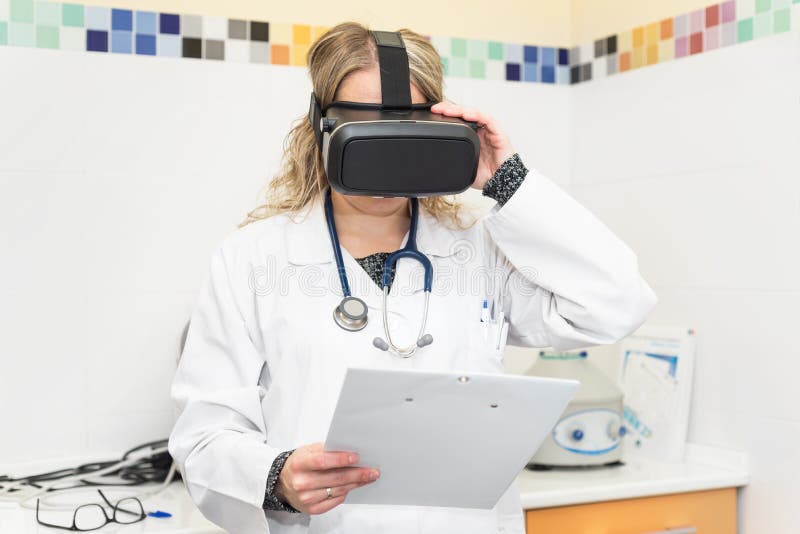 Scientist with Clipboard Using Virtual Reality Glasses for Research in ... Scientist with Clipboard Using Virtual Reality Glasses for Research in ...