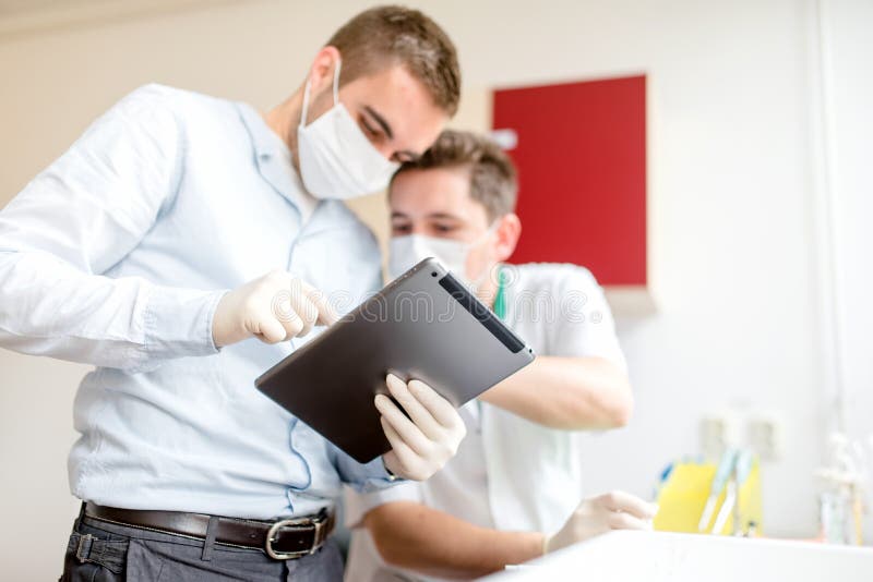 Scientist College Students Making Experiments and Learning from Tablet ...