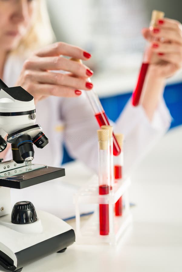 Scientist Conducting DNA Test in Laboratory Stock Image - Image of ...