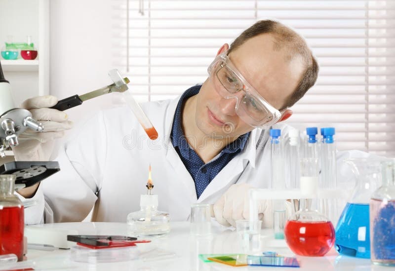 Scientist Conducting Experiments Stock Photo - Image of chemistry, male ...