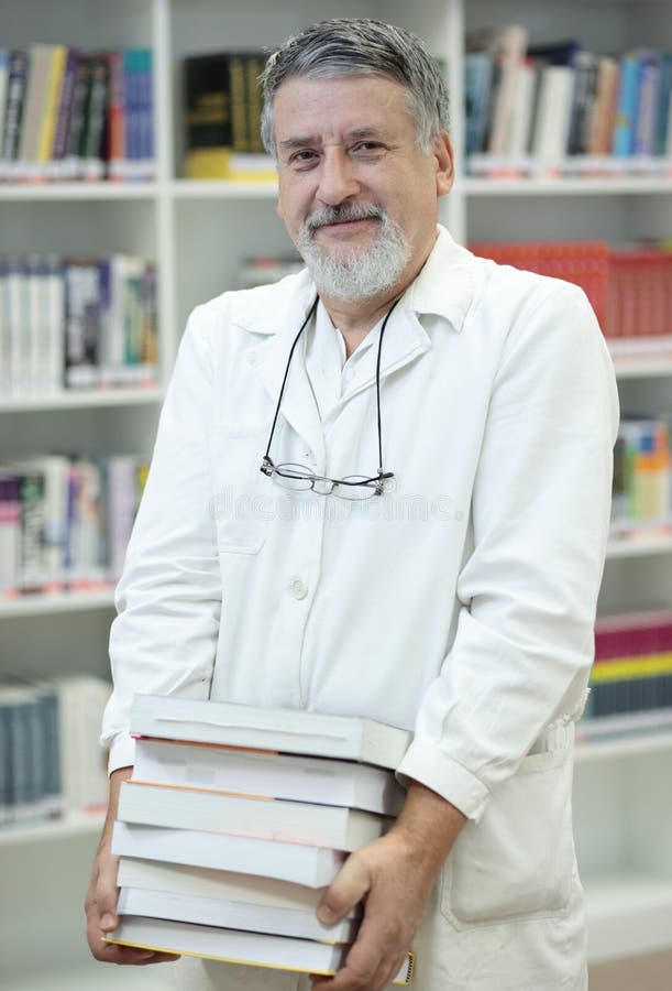Scientist/doctor in a Library Stock Photo - Image of people, bookshelf ...