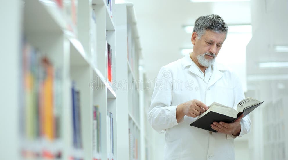 Scientist/doctor in a Library Stock Photo - Image of people, bookshelf ...