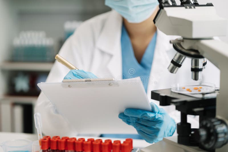 Scientist or Tech Holds Liquid Biological Sample in Gloved. Stock Image ...