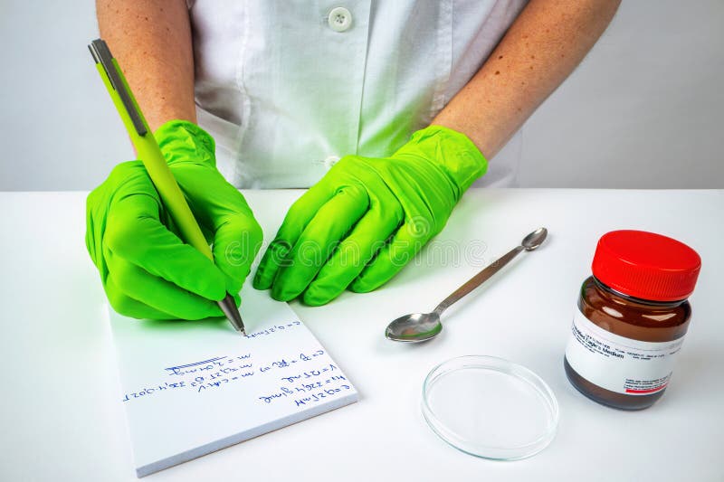 The Scientist Doctor Writes Notes during His Research in a Notebook ...