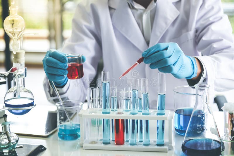 Scientist Man Doing Chemical Experiment, Making Analyzing, Looking ...