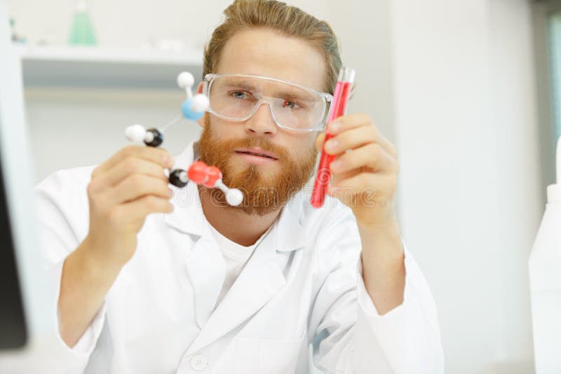 Scientist Doing Experiments with Chemical Liquid in Lab Stock Image ...