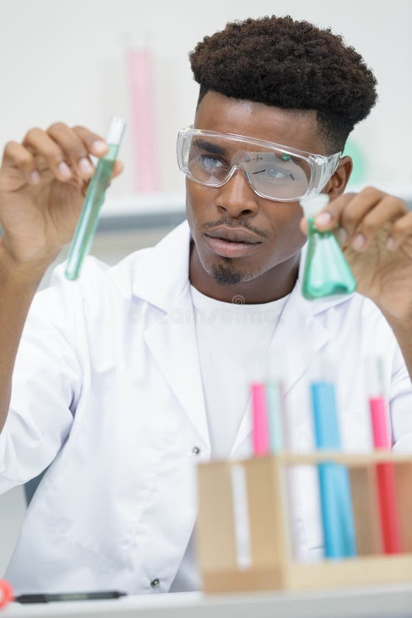 Scientist Doing Experiments with Chemical Liquid in Lab Stock Image ...