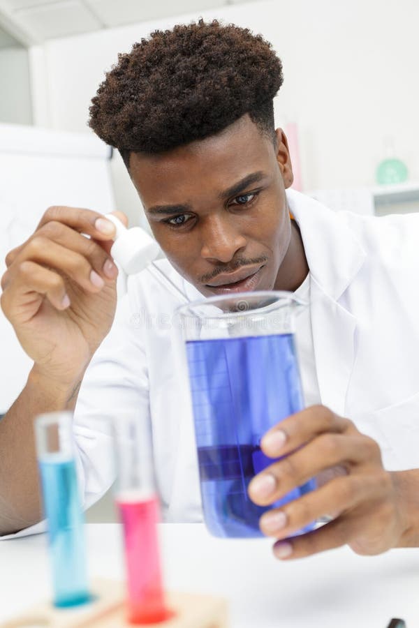 Scientist Doing Experiments with Chemical Liquid in Lab Stock Image ...