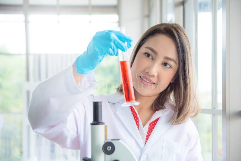 Scientist Doing Science Experiment in Laboratory Stock Photo - Image of ...