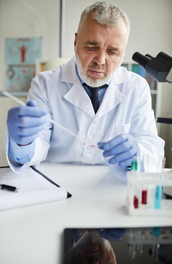 Scientist Doing Scientific Experiment Stock Photo - Image of discovery ...