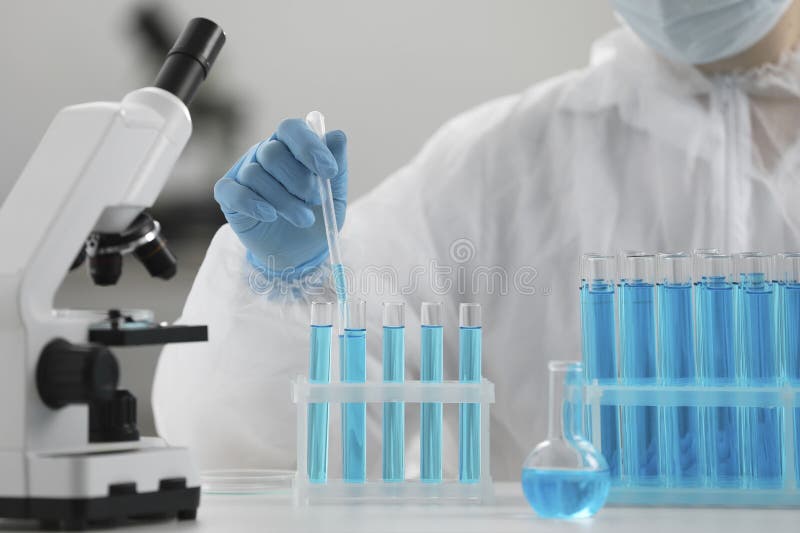 Dripping Sample into Test Tube in Chemistry Laboratory Stock Image ...