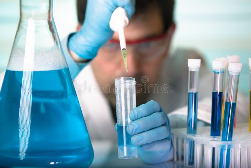 Scientist Dropping Chemical Sample in Tube Stock Image - Image of ...