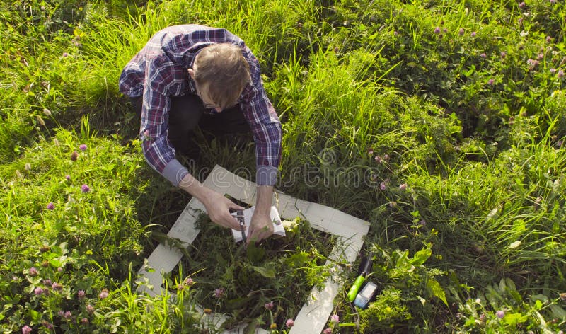 Scientist Ecologist Taking a Water Sample and Reading Ph Value at River ...