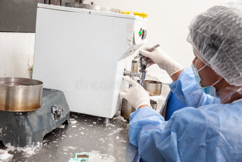 Scientist Embedding Tissues in Paraffin Blocks for Sectioning ... Scientist Embedding Tissues in Paraffin Blocks for Sectioning ...