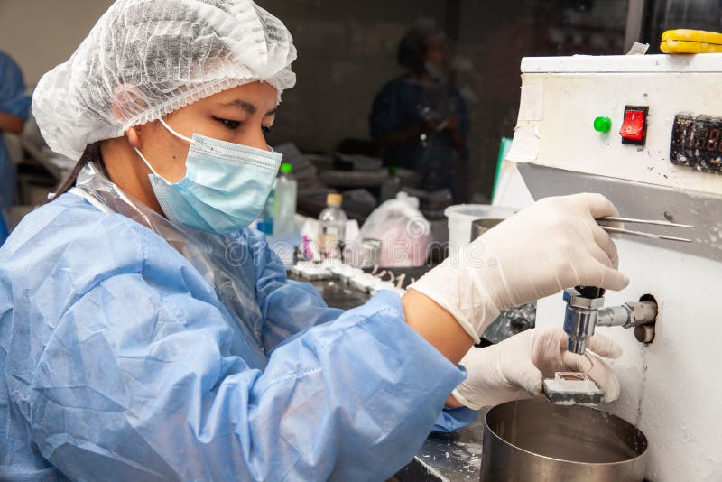 Scientist Embedding Tissues in Paraffin Blocks for Sectioning ... Scientist Embedding Tissues in Paraffin Blocks for Sectioning ...