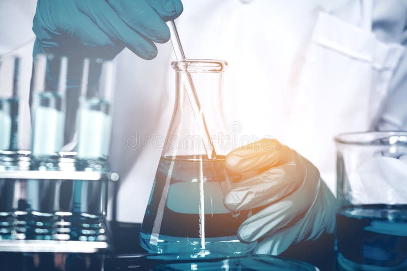 Scientist with Equipment Holding Tools during Scientific Experim Stock ...