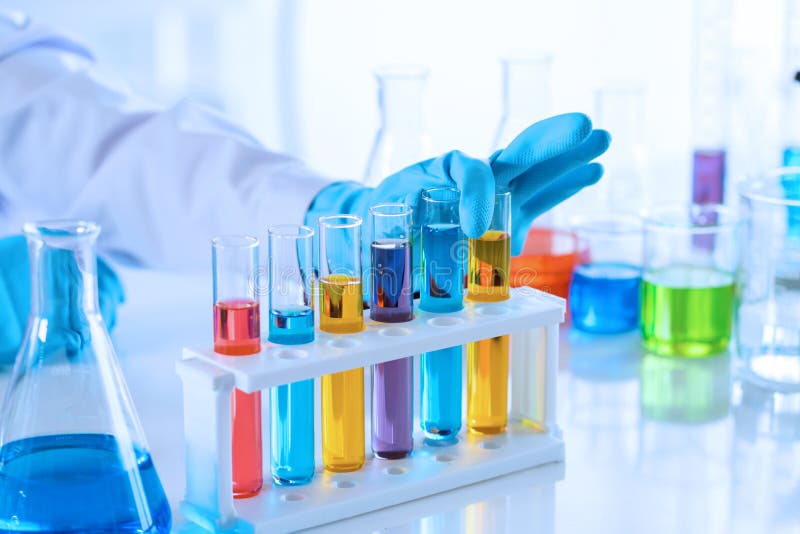 Scientist with Equipment and Science Experiments, Laboratory Glassware ...