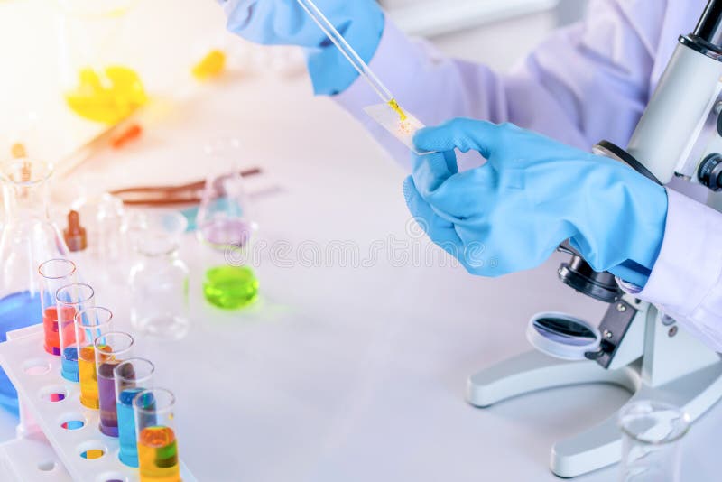 Scientist with Equipment and Science Experiments, Laboratory Glassware ...