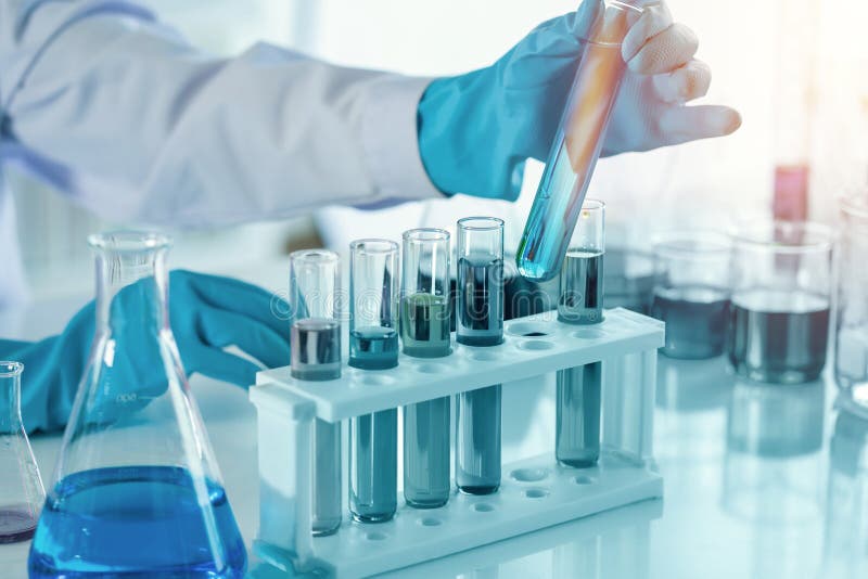 Scientist with Equipment and Science Experiments, Laboratory Glassware ...