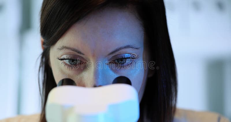 Scientist Examines Sample Using Microscope in Laboratory Stock Video ...