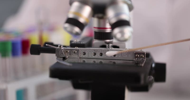 Scientist Examines Smear Sample Under Microscope Closeup Stock Video ...