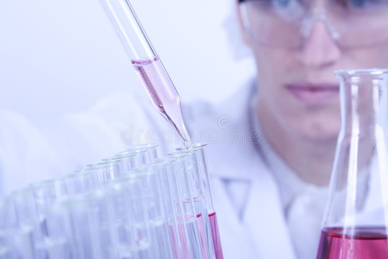 Scientist Experimenting with Fluid Stock Image - Image of chemical ...