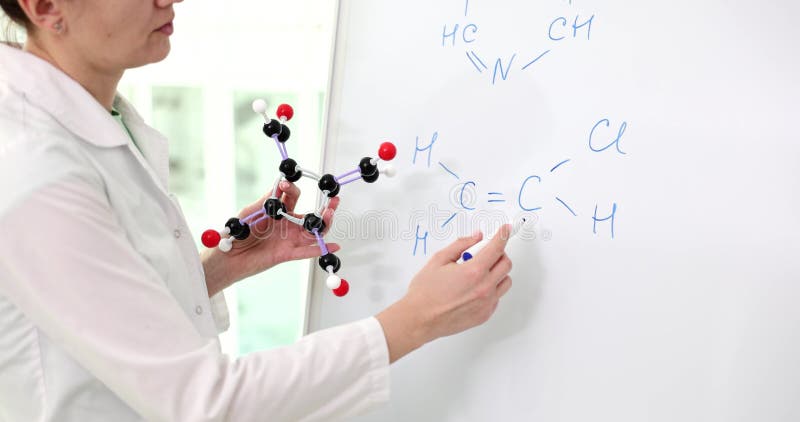 Scientist Explains Chemical Formula Written on Whiteboard Stock Video ...