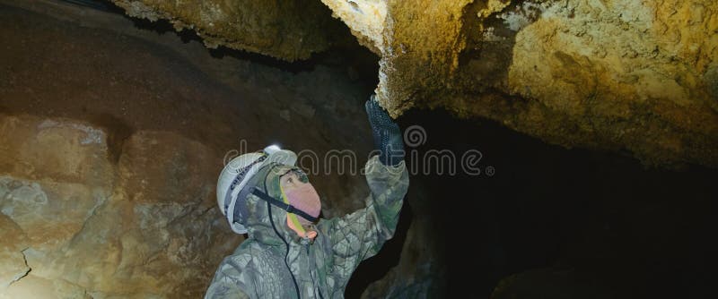Scientist Exploring of Cave for Geology Science. Professional ... Scientist Exploring of Cave for Geology Science. Professional ...
