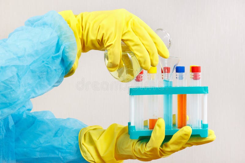 Scientist Hands in Rubber Gloves Doing Chemical Experiments in ...