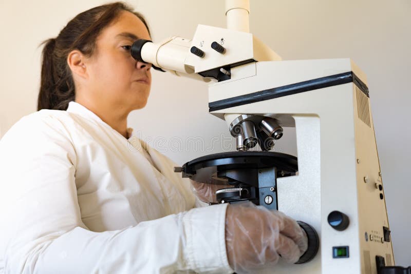 Scientist Looking through the Microscope Stock Photo - Image of medical ...