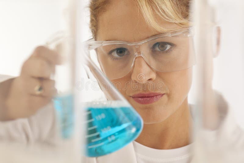Scientist holding beaker stock image. Image of chemistry - 17241449