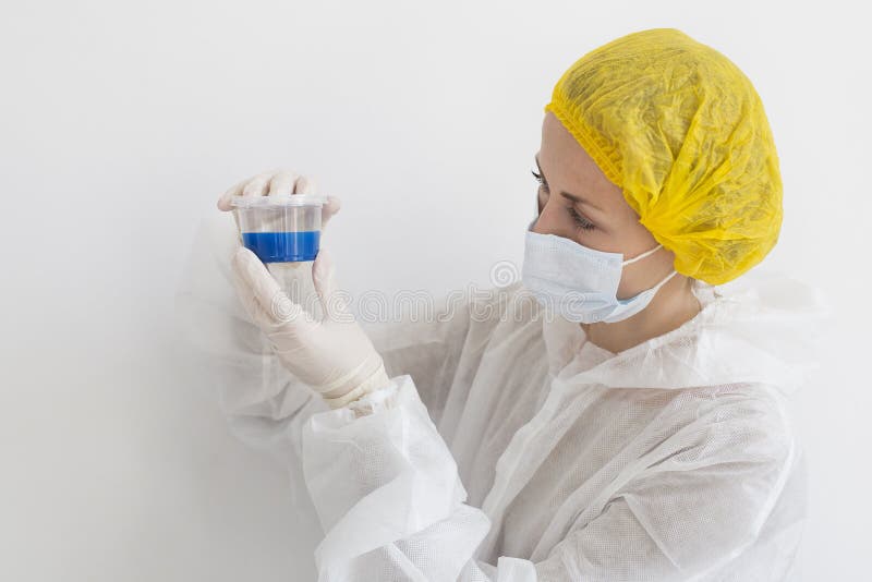 Scientist Holding Blue Container Stock Image - Image of experiment ...